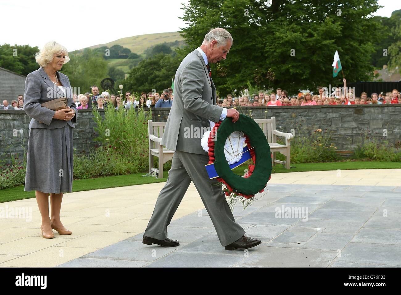 The Prince of Wales and Duchess of Cornwall lay a wreath in memory of ...