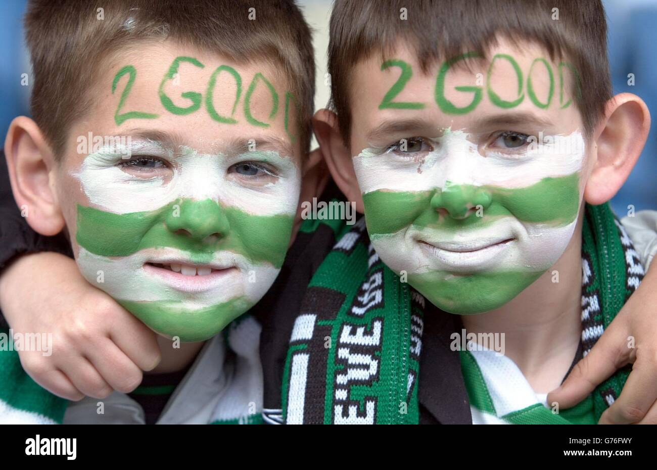 Two young Celtic fans get ready for the Tennant's Scottish Cup final ...