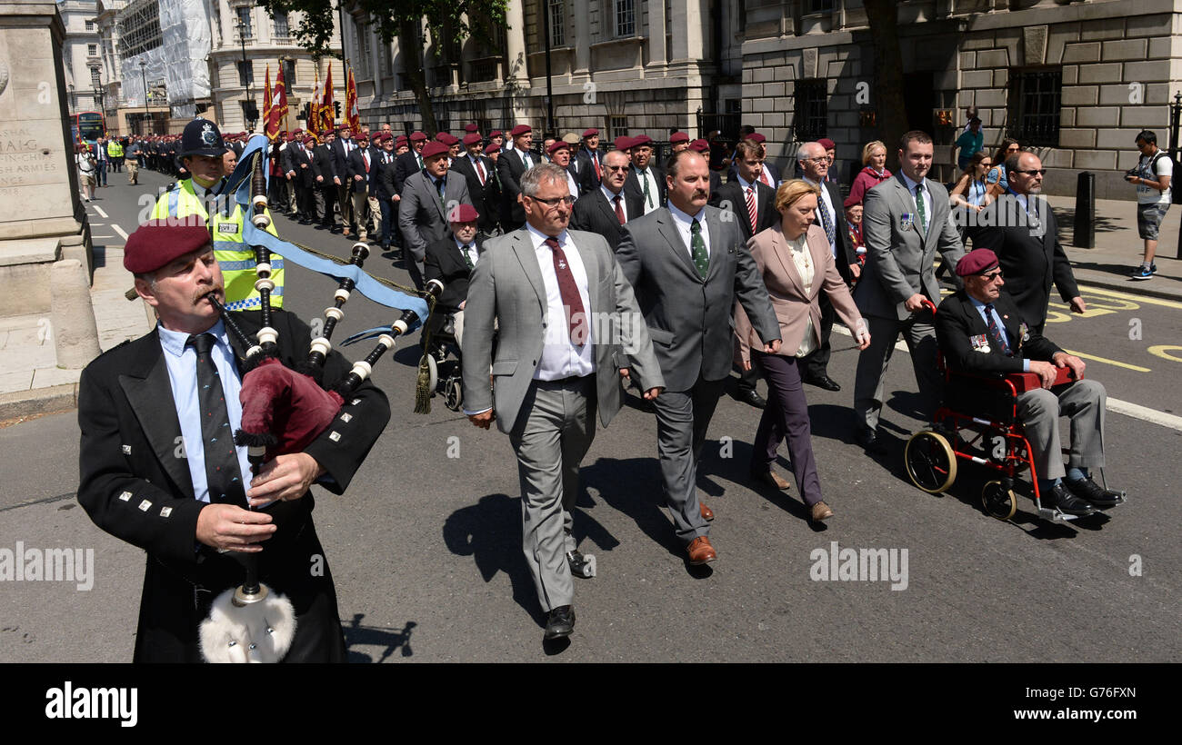 Stewart McLaughlin (pushing wheelchair), son of Corporal Stewart ...