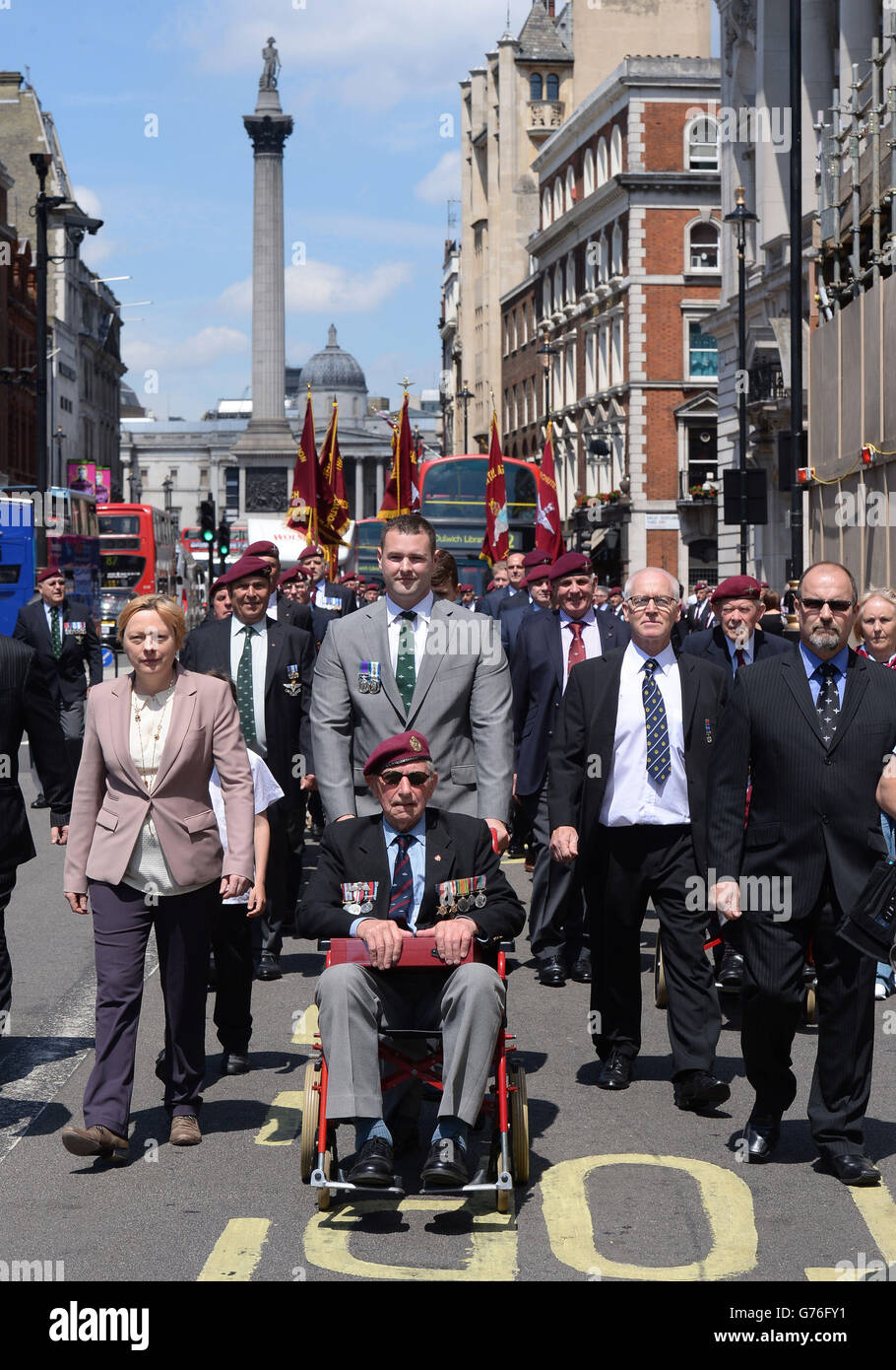 Stewart McLaughlin (pushing wheelchair), son of Corporal Stewart ...