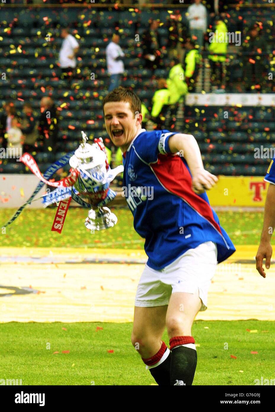 Rangers captain Barry Ferguson celebrates winning the Tennent's ...