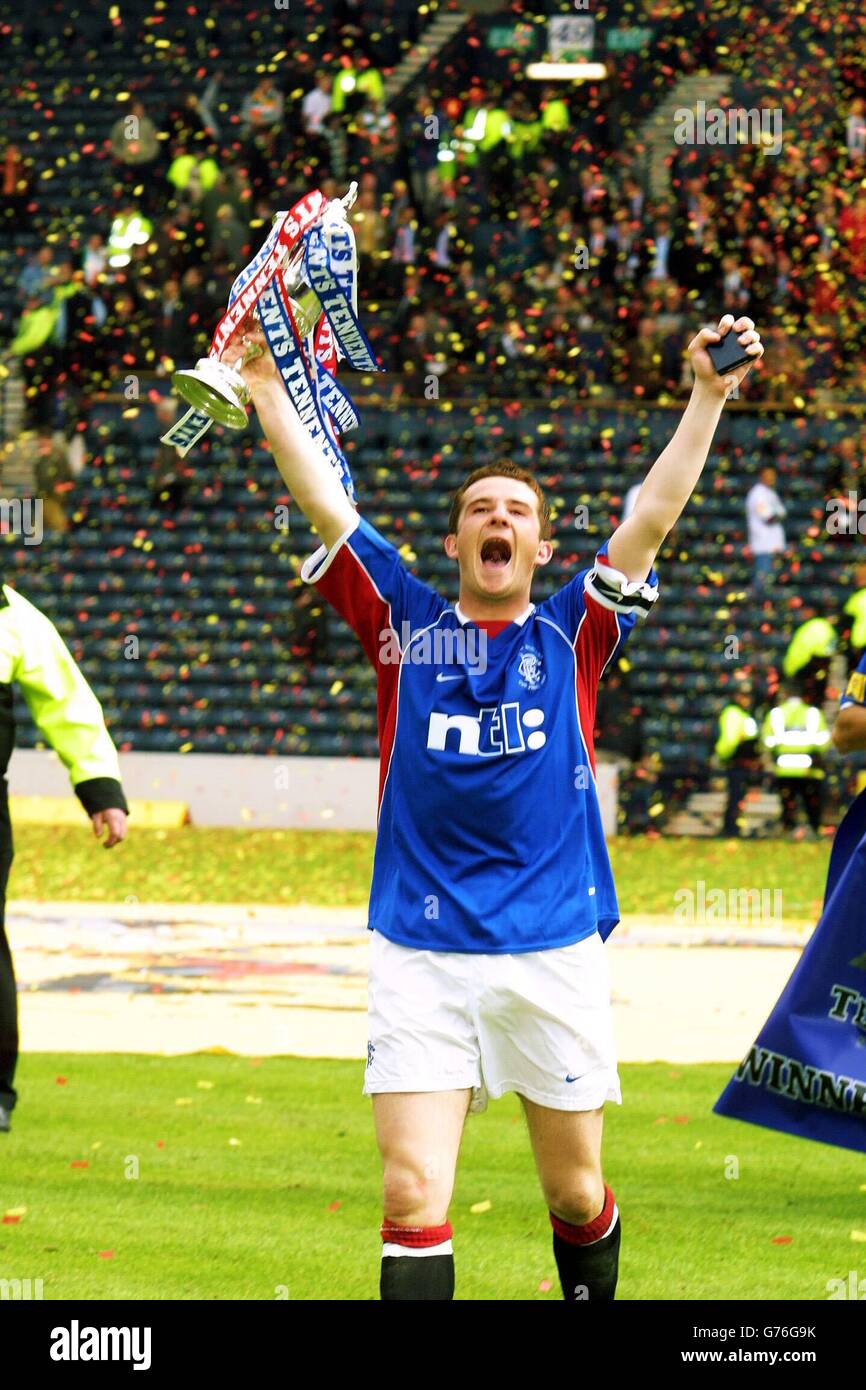 Rangers captain Barry Ferguson celebrates winning the Tennent's ...