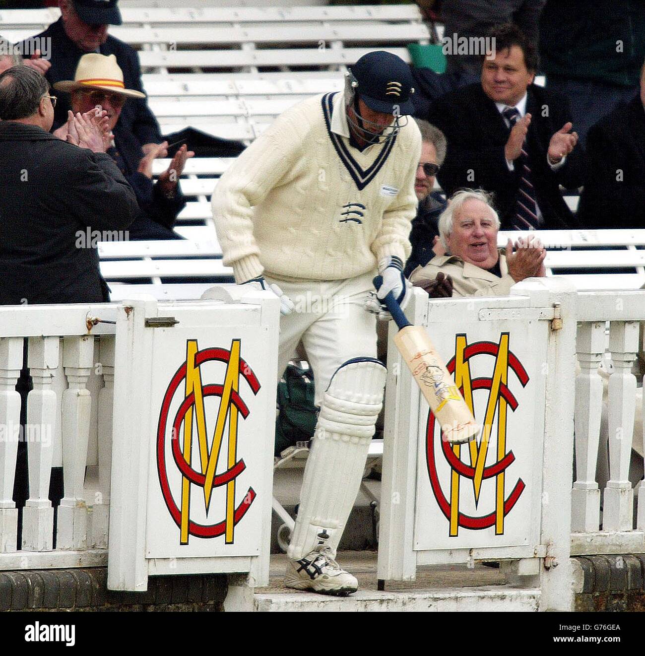 Middlesex captain Angus Fraser walks out to bat for the final time at ...