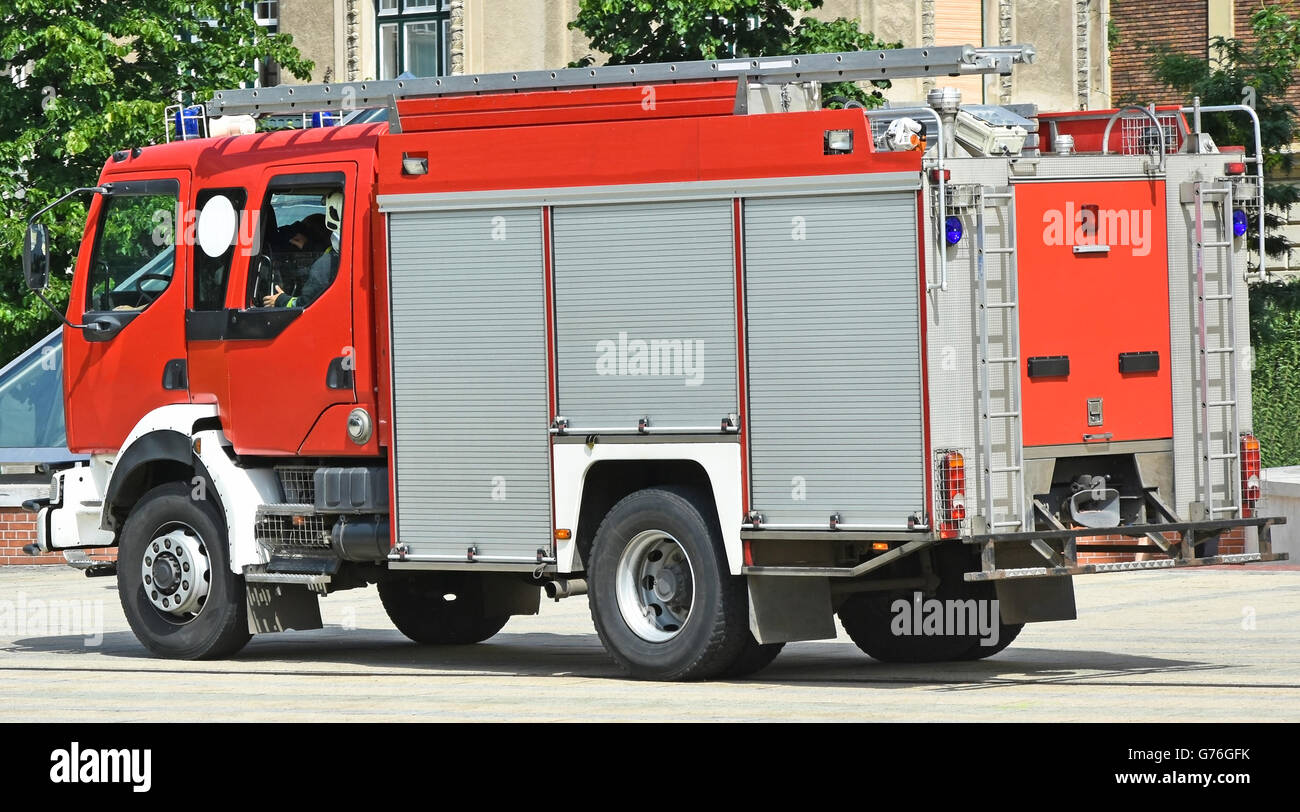 Fire truck on the street in the city Stock Photo - Alamy