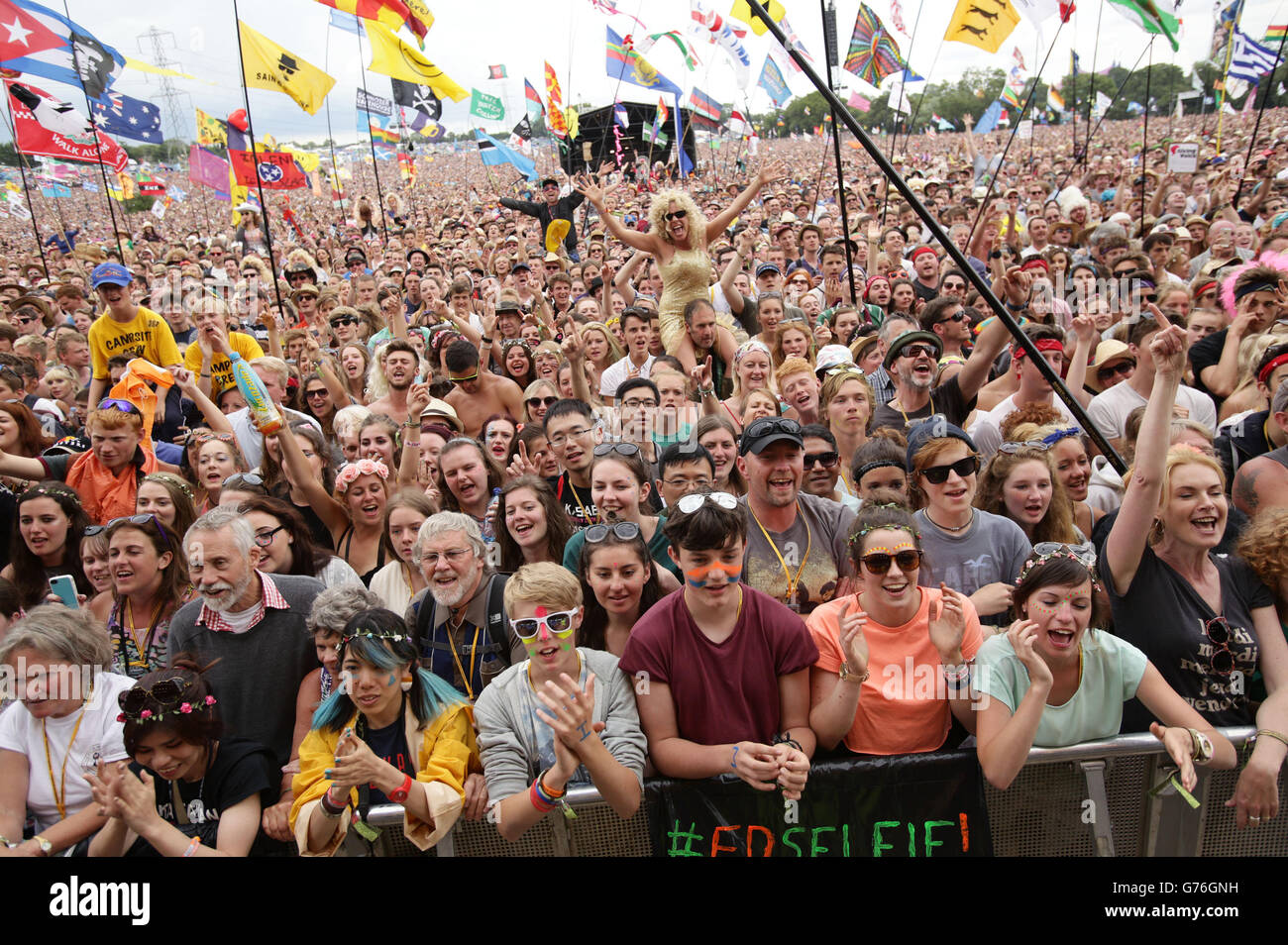 Crowd cheer as Dolly Parton performs on the Pyramid Stage at the ...
