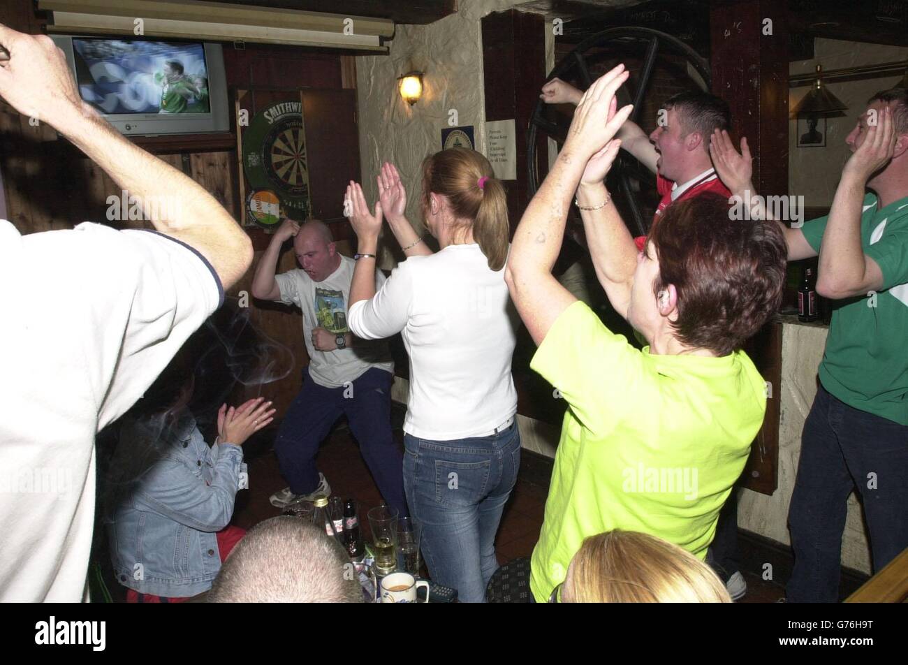 Ireland fans at tavern in Cork Stock Photo - Alamy