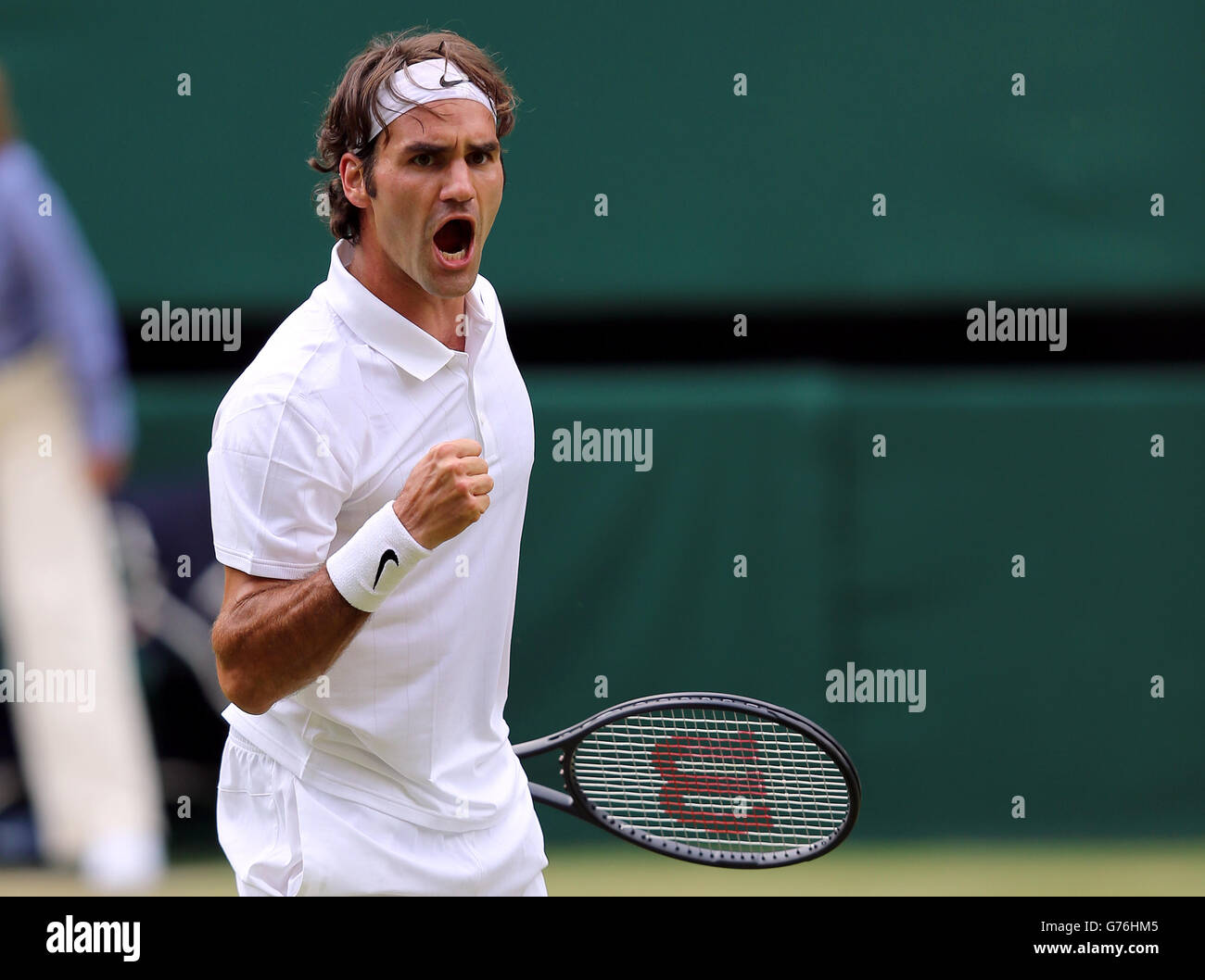 Switzerland's Roger Federer celebrates breaking back in the fourth set ...