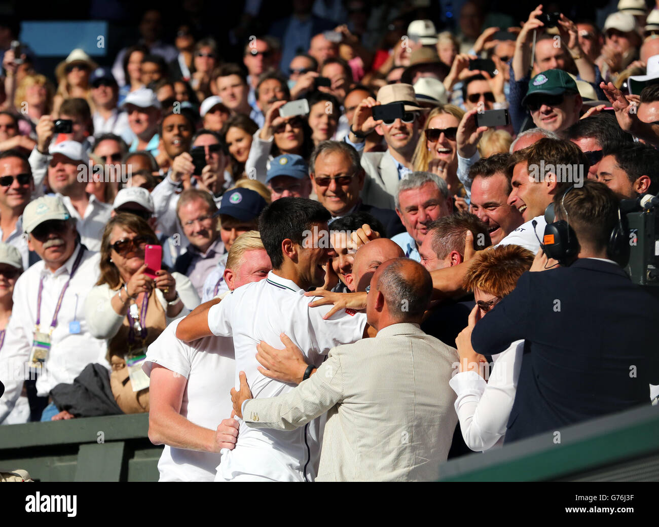 Serbia's Novak Djokovic goes to his players box after beating ...