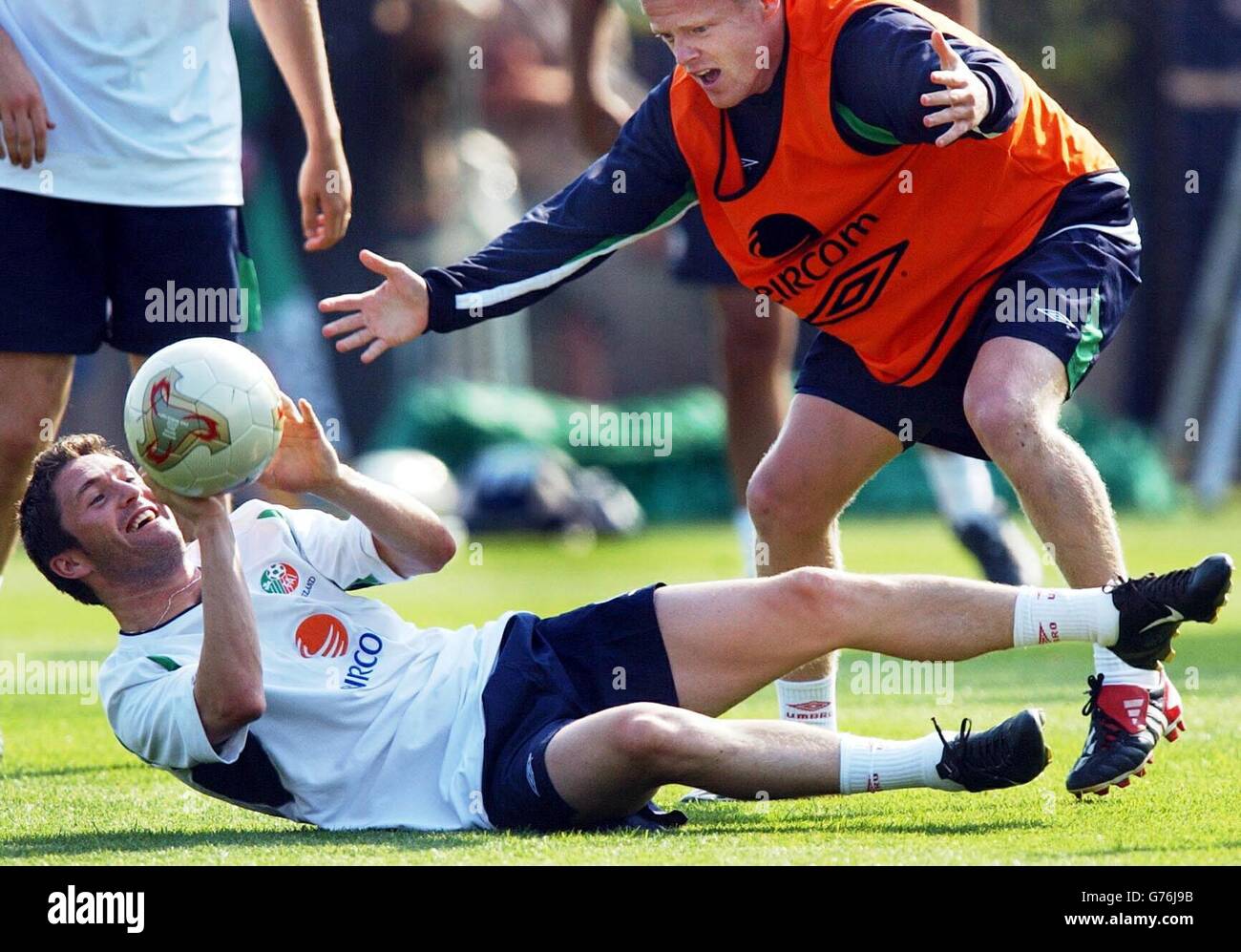 Robbie Keane and Damien Duff play Gaelic Football at the Irish team's ...