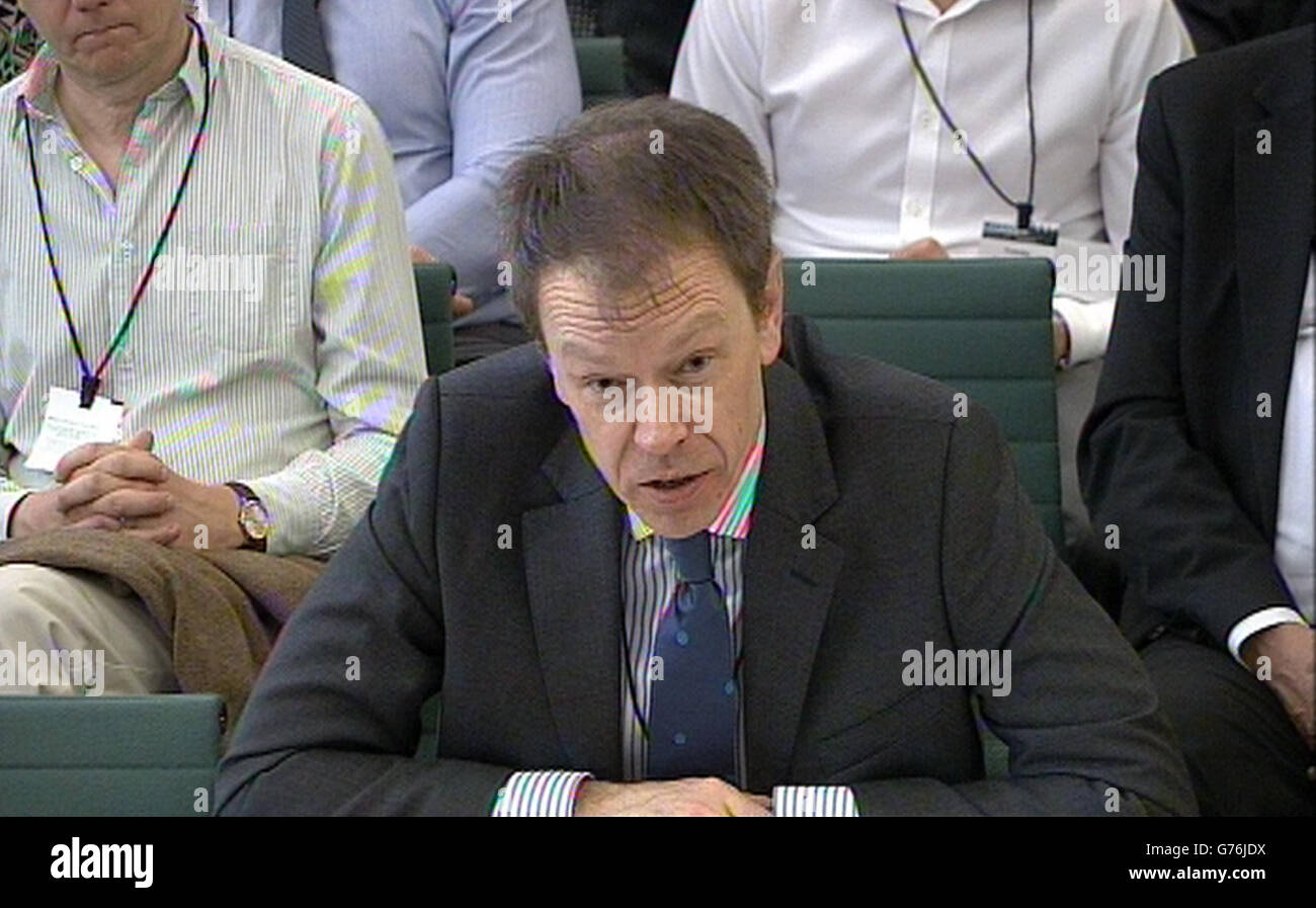 Head of the Passport Office, Paul Pugh giving evidence to Home Affairs ...
