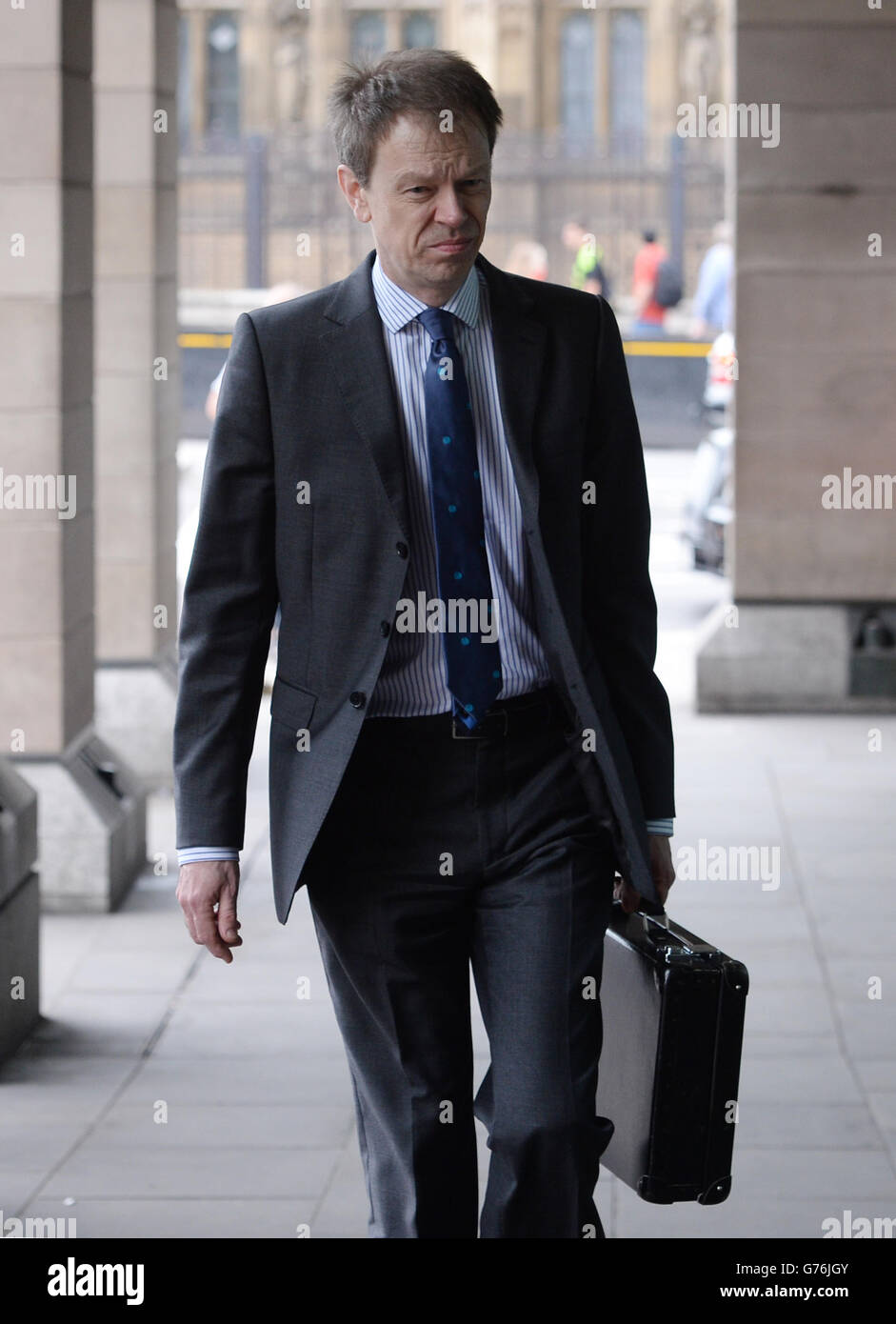Head of the Passport Office, Paul Pugh arrives to give evidence to Home ...