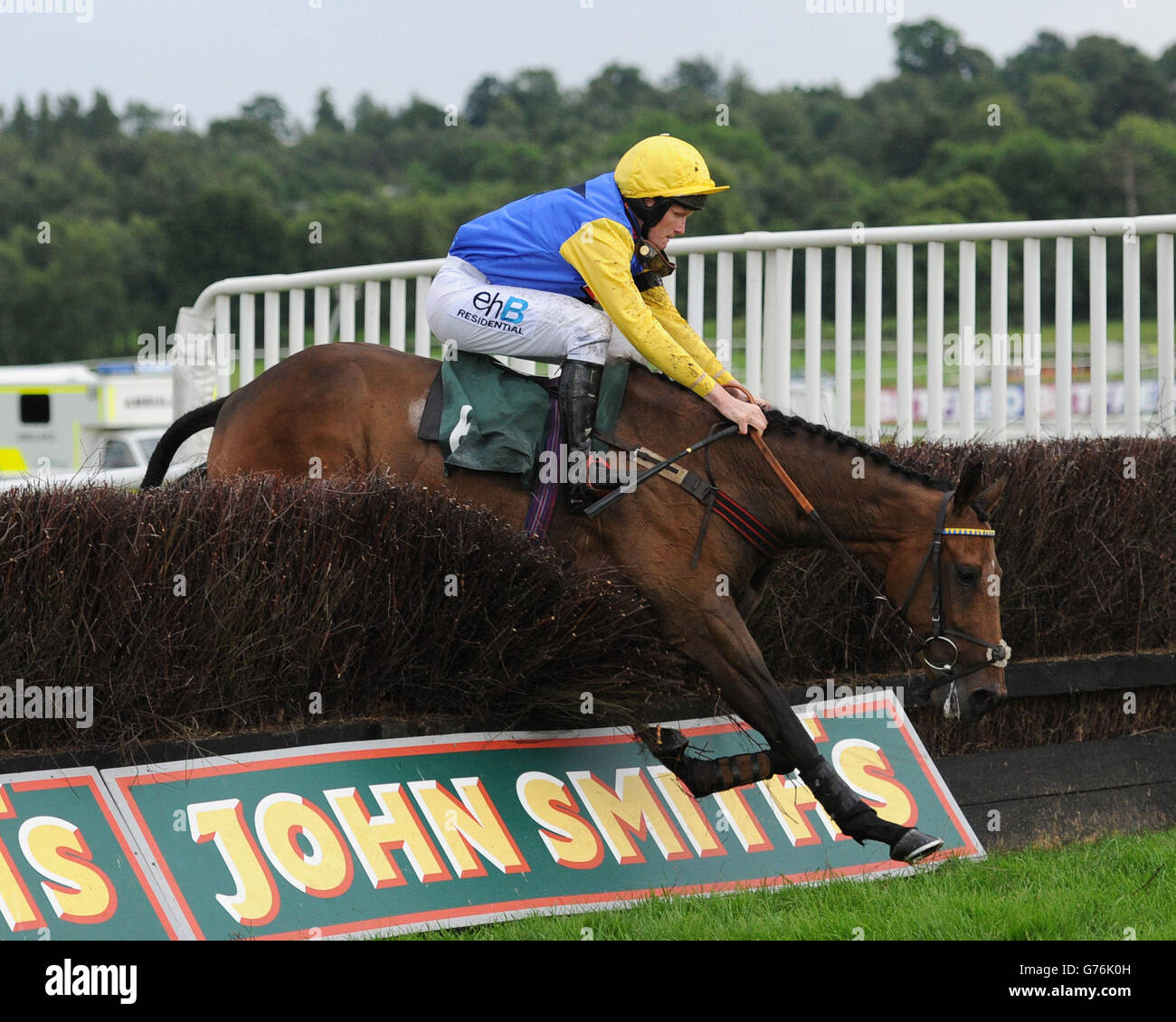 Horse Racing - Uttoxeter Racecourse. Izza Diva and Charlie Poste land ...