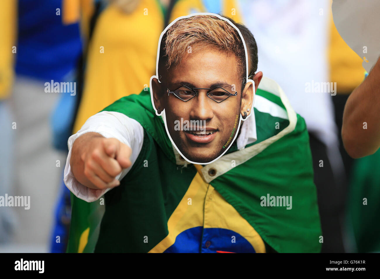 A Brazil fan wearing a Neymar mask inside the Estadio Mineirao before ...
