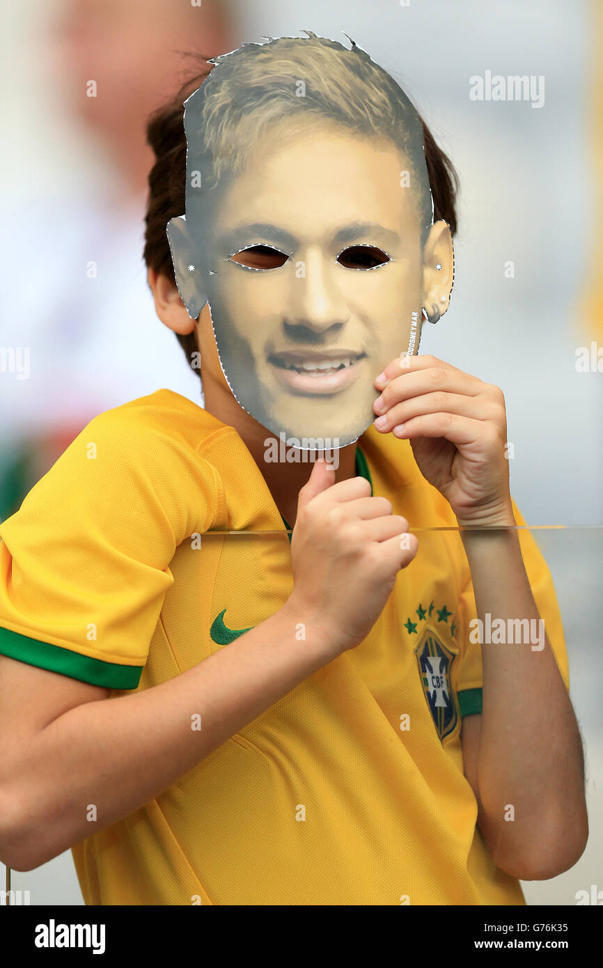 A Brazil fan wearing a Neymar mask inside the Estadio Mineirao before ...