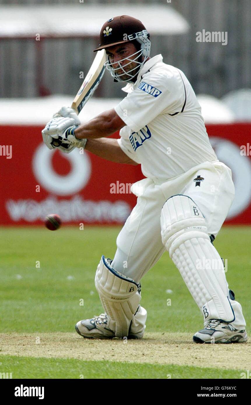 Surrey Cricket Captain, Adam Hollioake, in action on his way to a ...