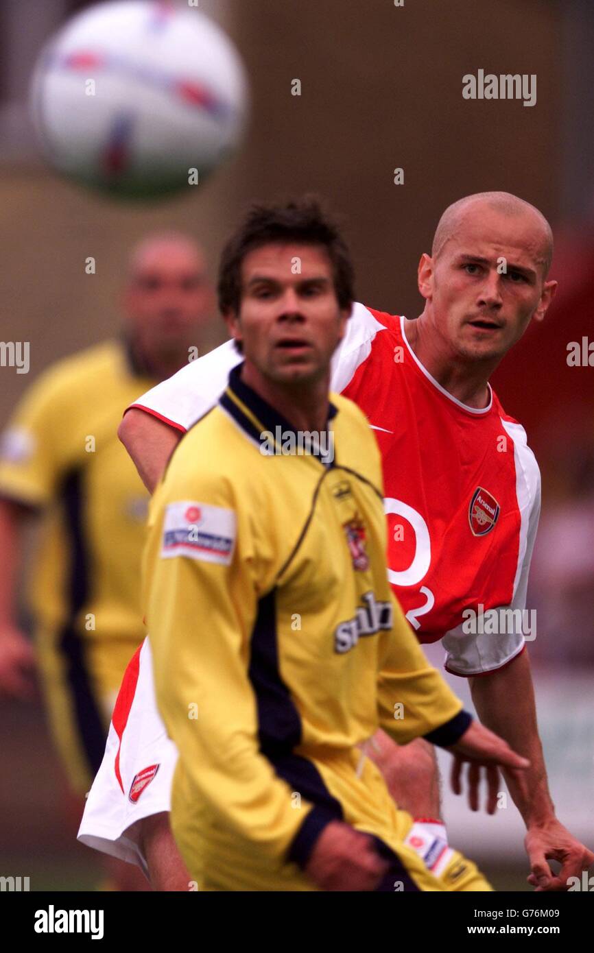 Arsenal's new signing Pascal Cygan clear the ball away from Stevenage ...