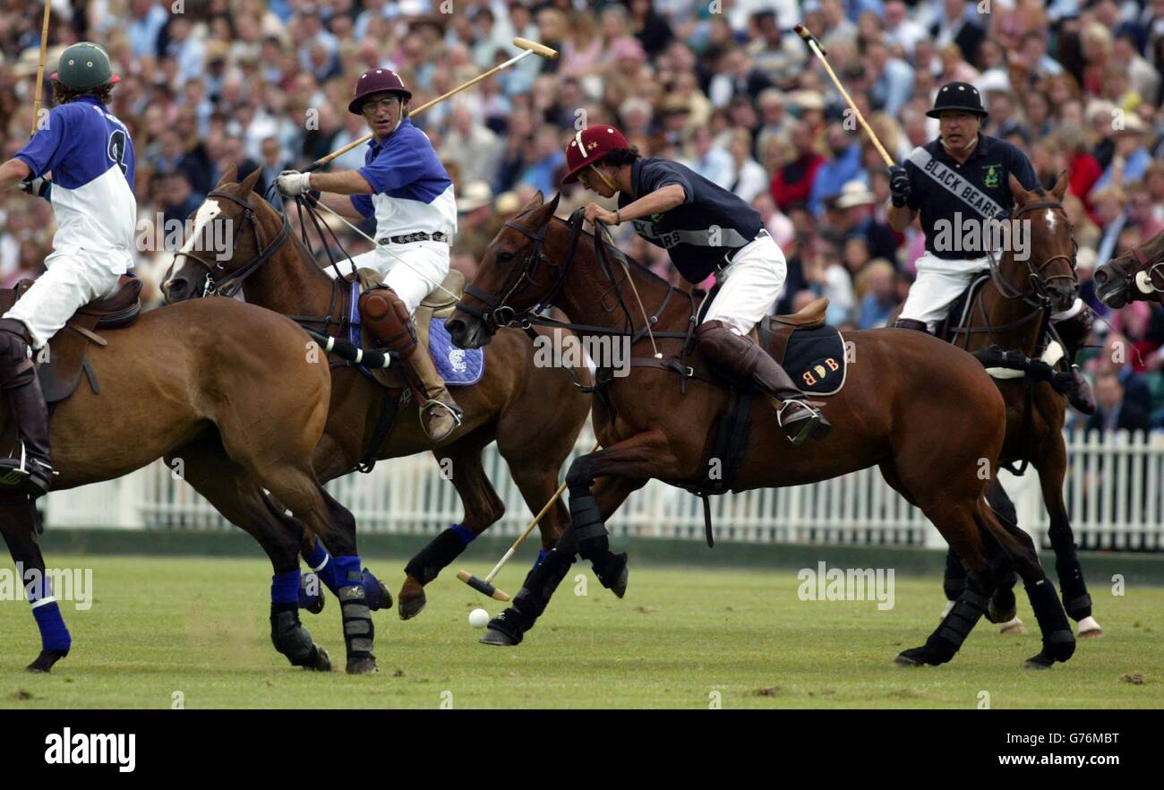 The Black Bears' Alejandro Novillo-Astrada (red helmet) in action ...