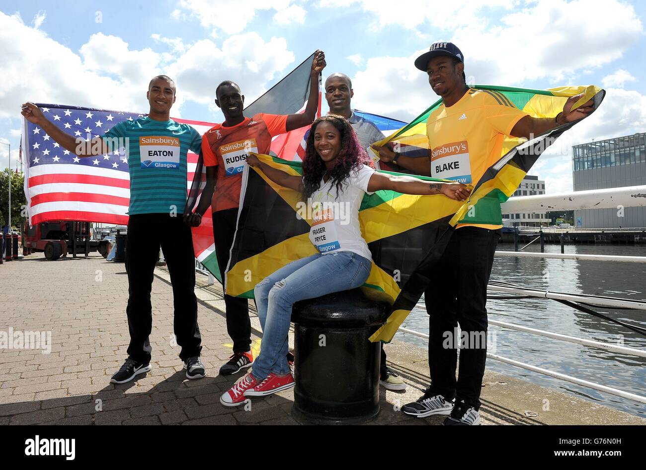 Athletes Shelly-Ann Fraser-Pryce (front) with (left-right) Ashton Eaton ...
