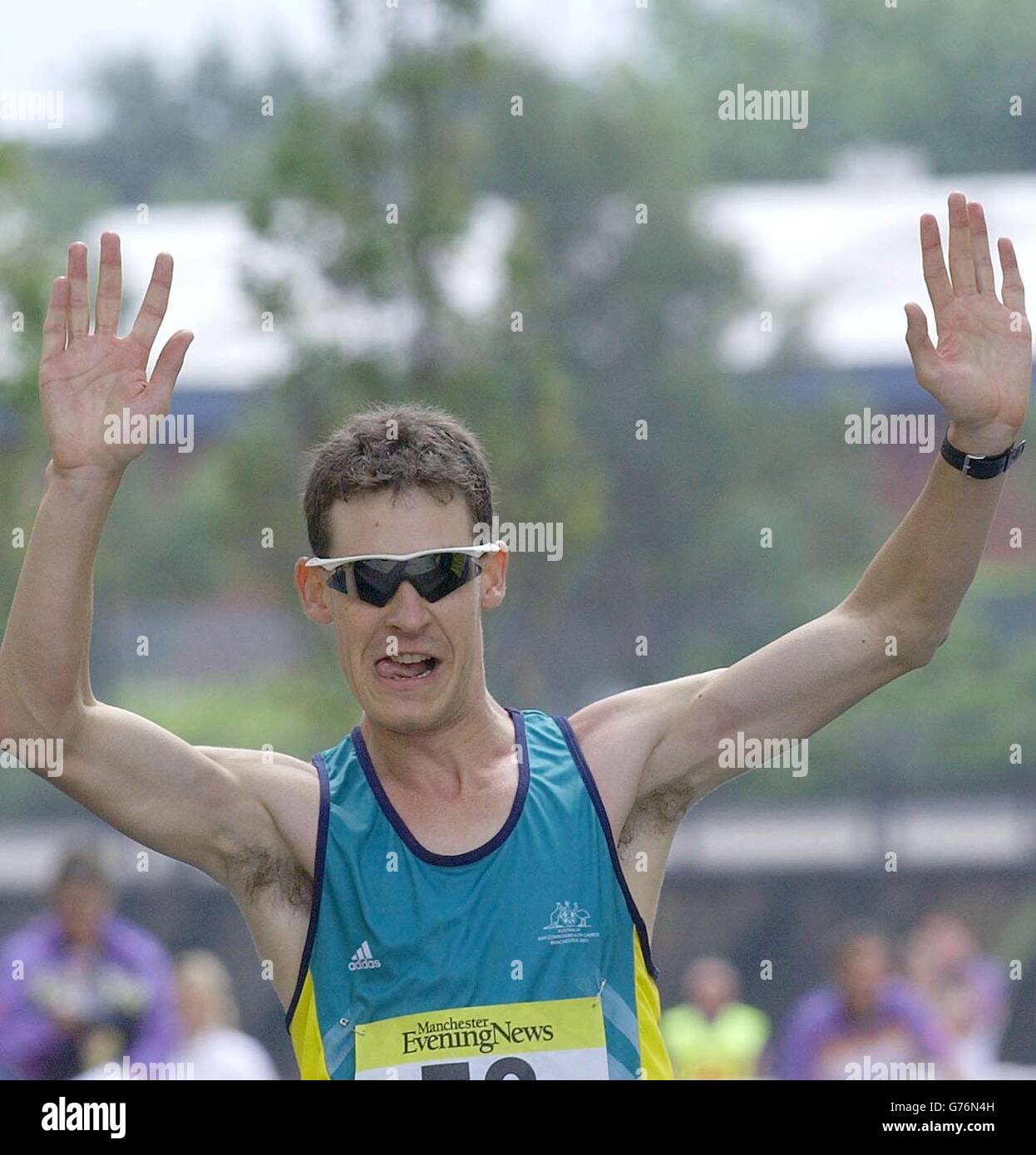 Nathan Deakes of Australia celebrates his victory in the Mens 50k Walk ...