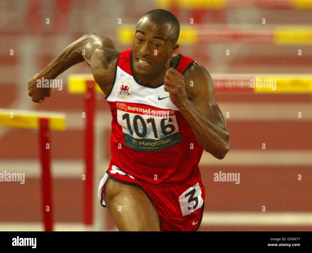Wales' Colin Jackson lunges in vain for the line only to be beaten into ...