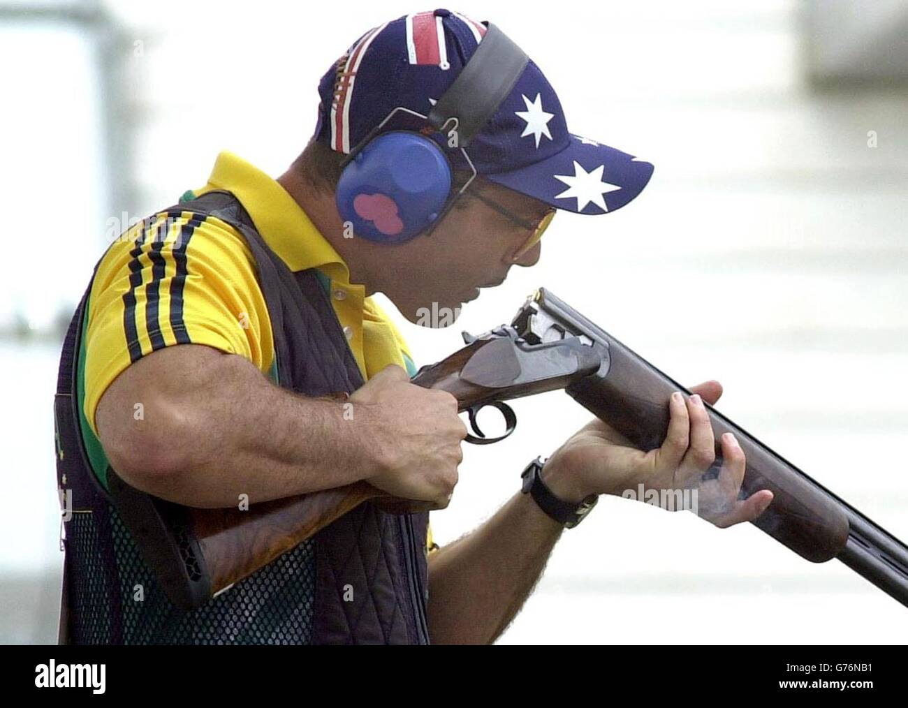 Australian Michael Diamond shooting in the Mens Trap Single Heats event ...