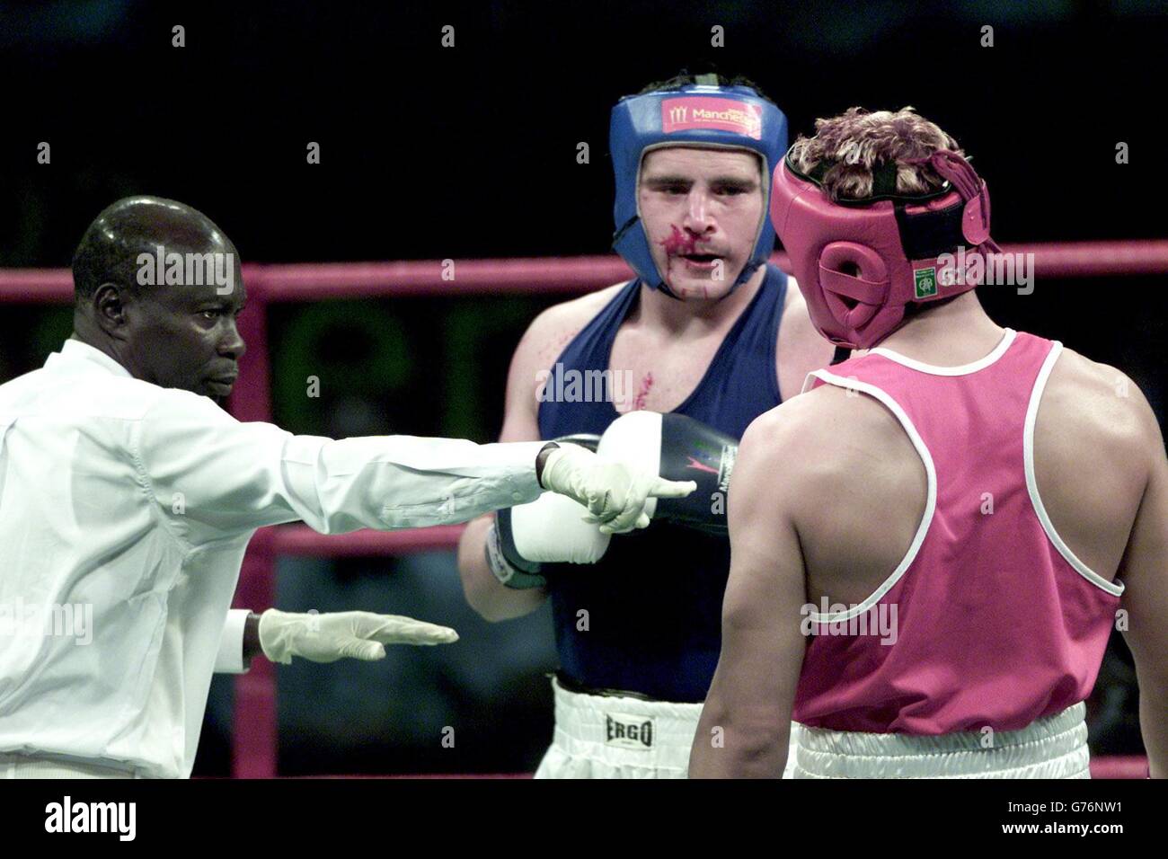 Welsh boxer Kevin Evans (blue) loses his Commonwealth semi-final Super ...