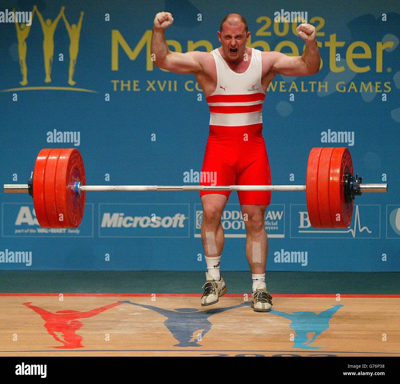 England's Anthony Arthur, celebrates lifting 180kg in the Clean & Jerk ...