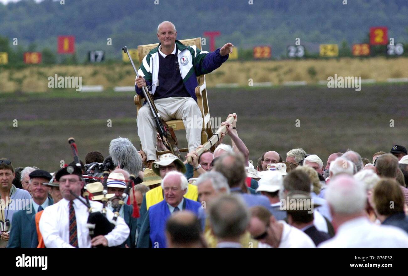 Northern Ireland's gold medal winner David Calvert is carried off from ...