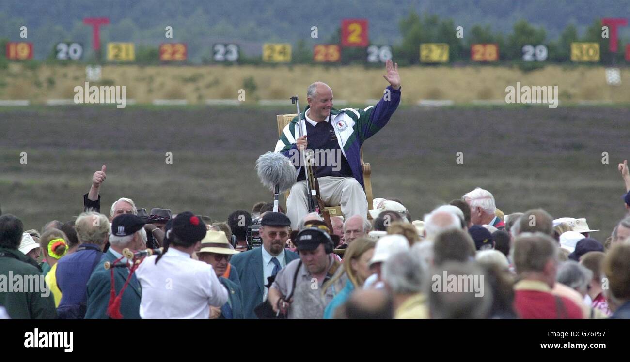 Northern Ireland's gold medal winner David Calvert is carried off from ...
