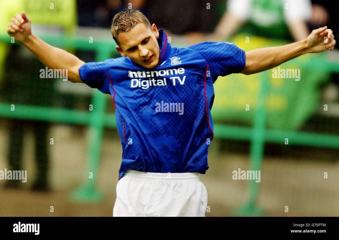 Rangers' Peter Lovenkrands celebrates his first goal, putting Rangers ...