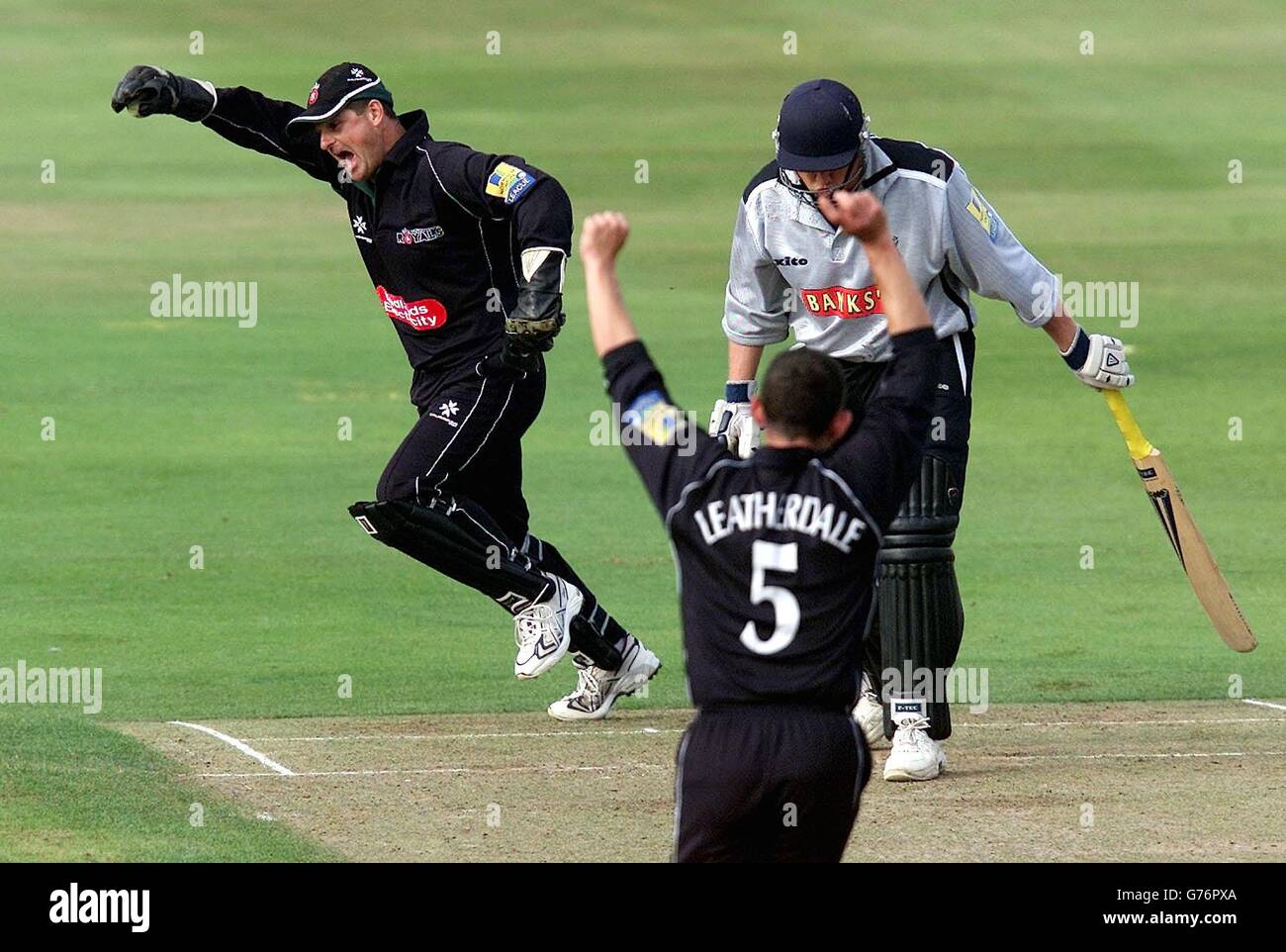 Worcestershire wicket-keeper Steve Rhodes celebrates taking the catch ...