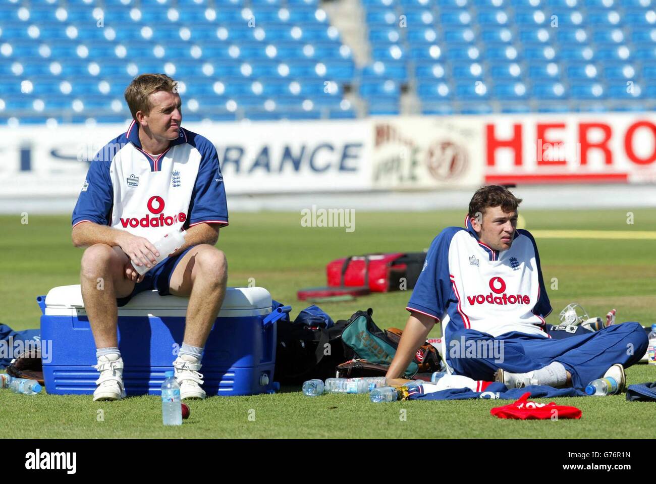 Dominic Cork and Steve Harmison take a break as the England cricket ...