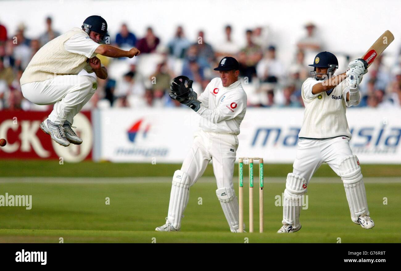 Cricket batting mid air jumping fielding hi-res stock photography and ...
