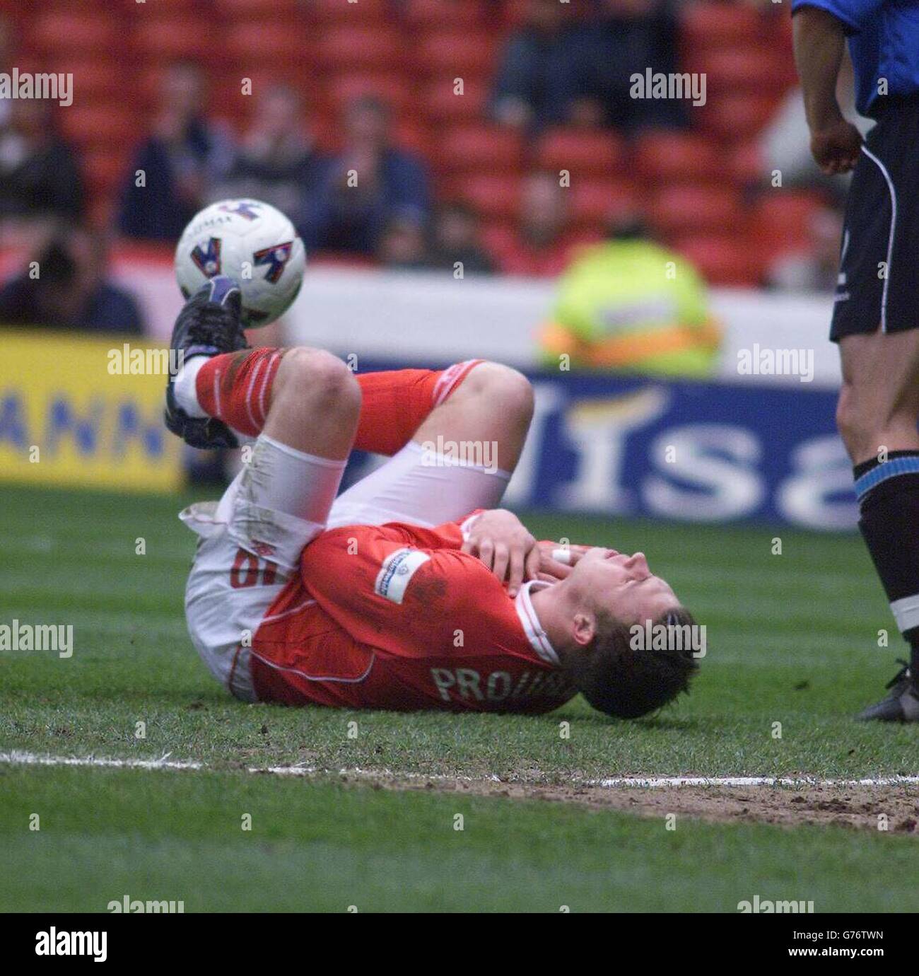 Nottingham Forrest's Adam Proud lock is tackled heavily during the ...