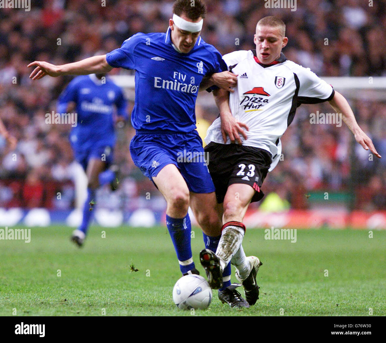 Chelsea's John Terry (left) tussles with Fulham's Sean Davis during the ...