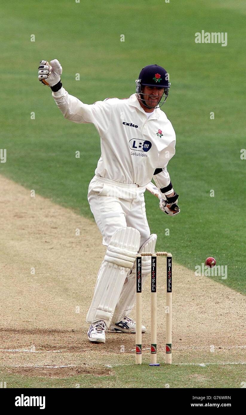 Lancashire's Mark Chilton is struck by a delivery from Warwickshire's ...