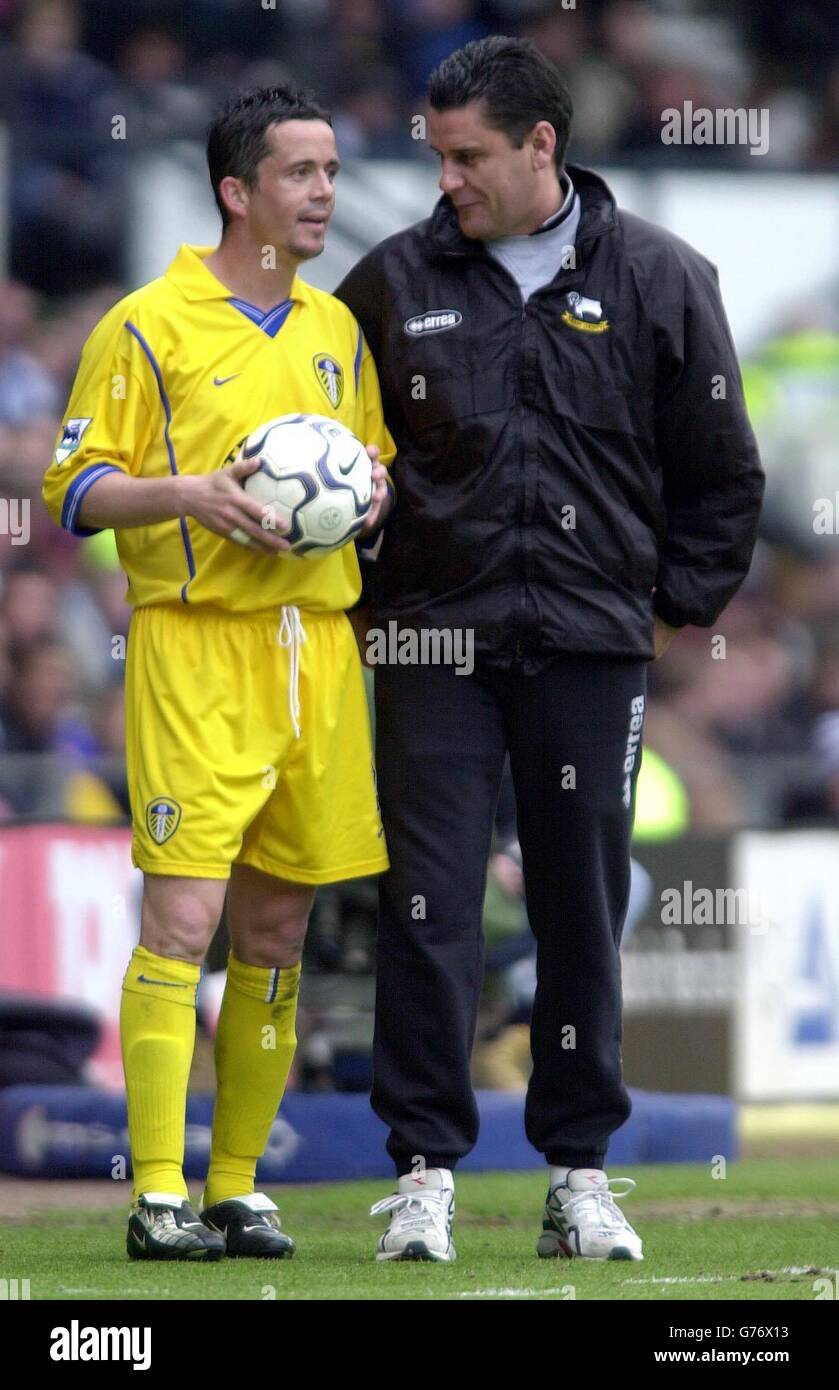 Derby manager John Gregory (right) chats with Leeds' Gary Kelly during ...