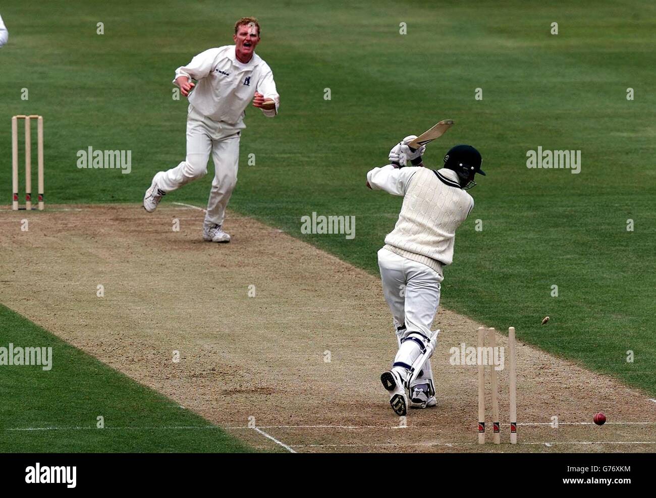 Worcestershire batsman Vikram Solanki is bowled by Warwickshire's ...