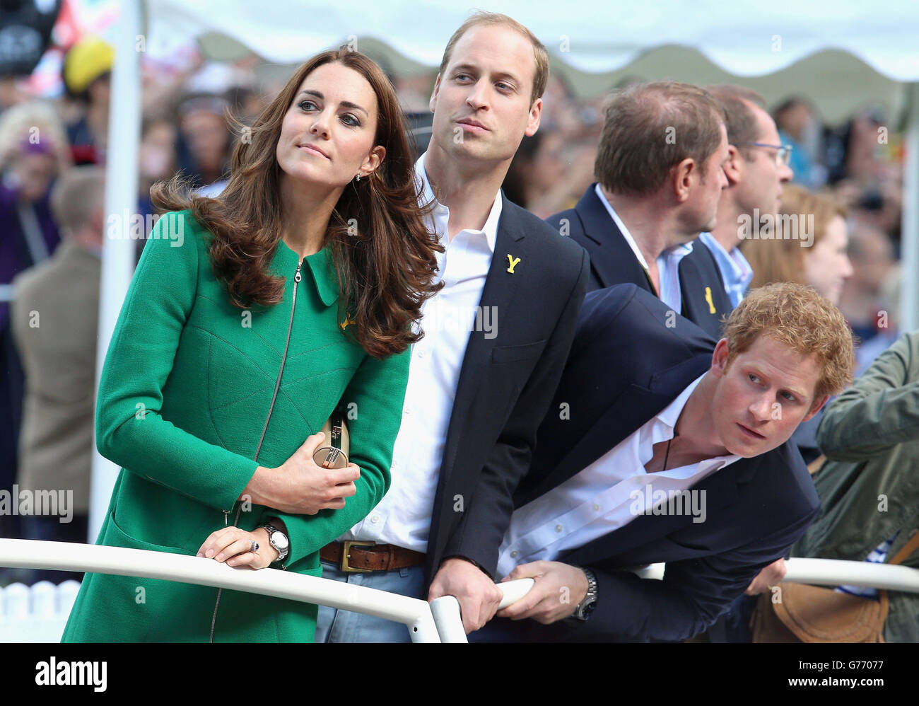 The Duke and Duchess of Cambridge and Prince Harry watch riders at the ...