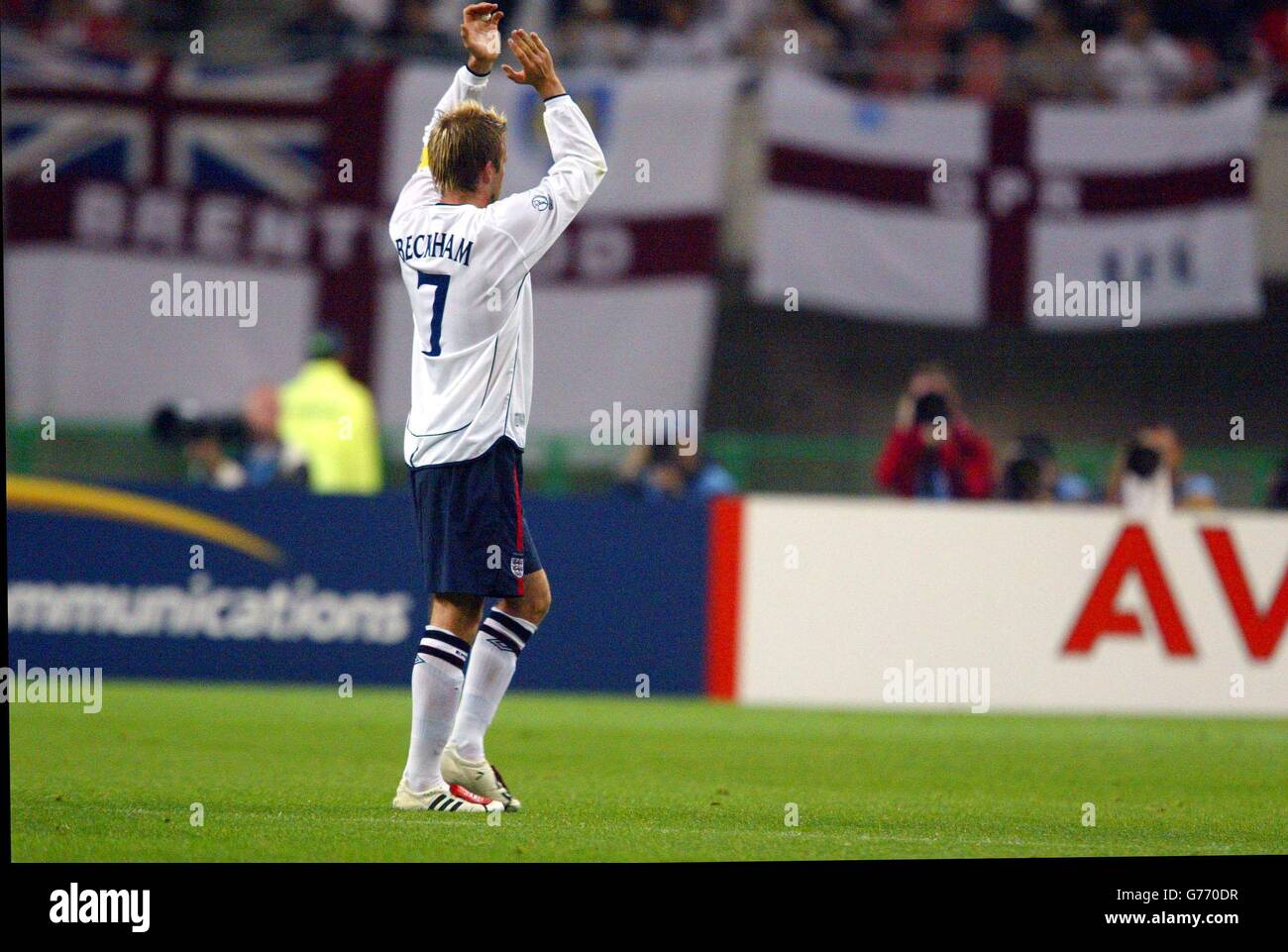 England captain David Beckham applauds the crowd after England secured ...
