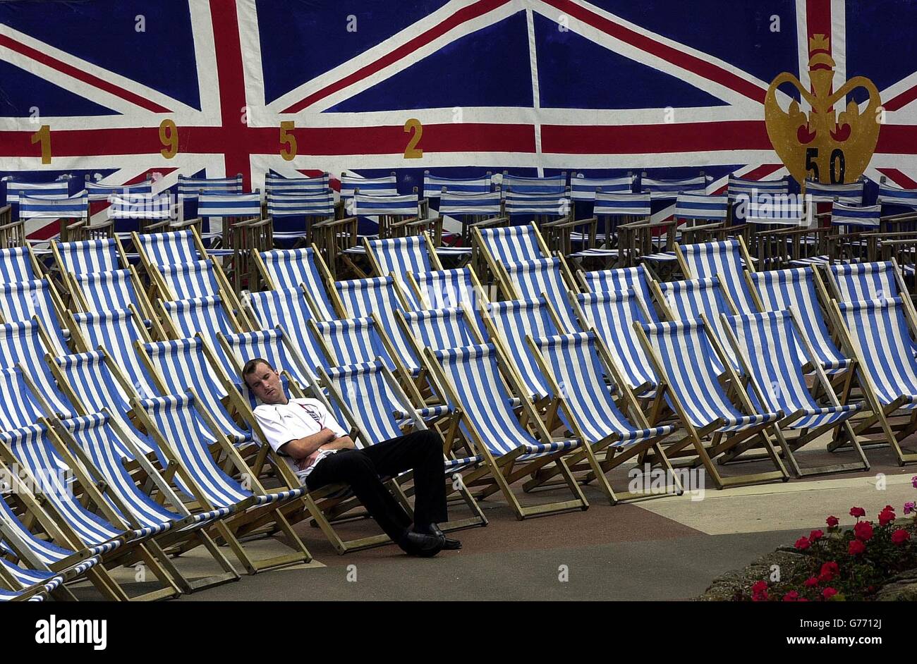 Football fans supporters sleeping chairs fifa world cup 2002 hi-res ...