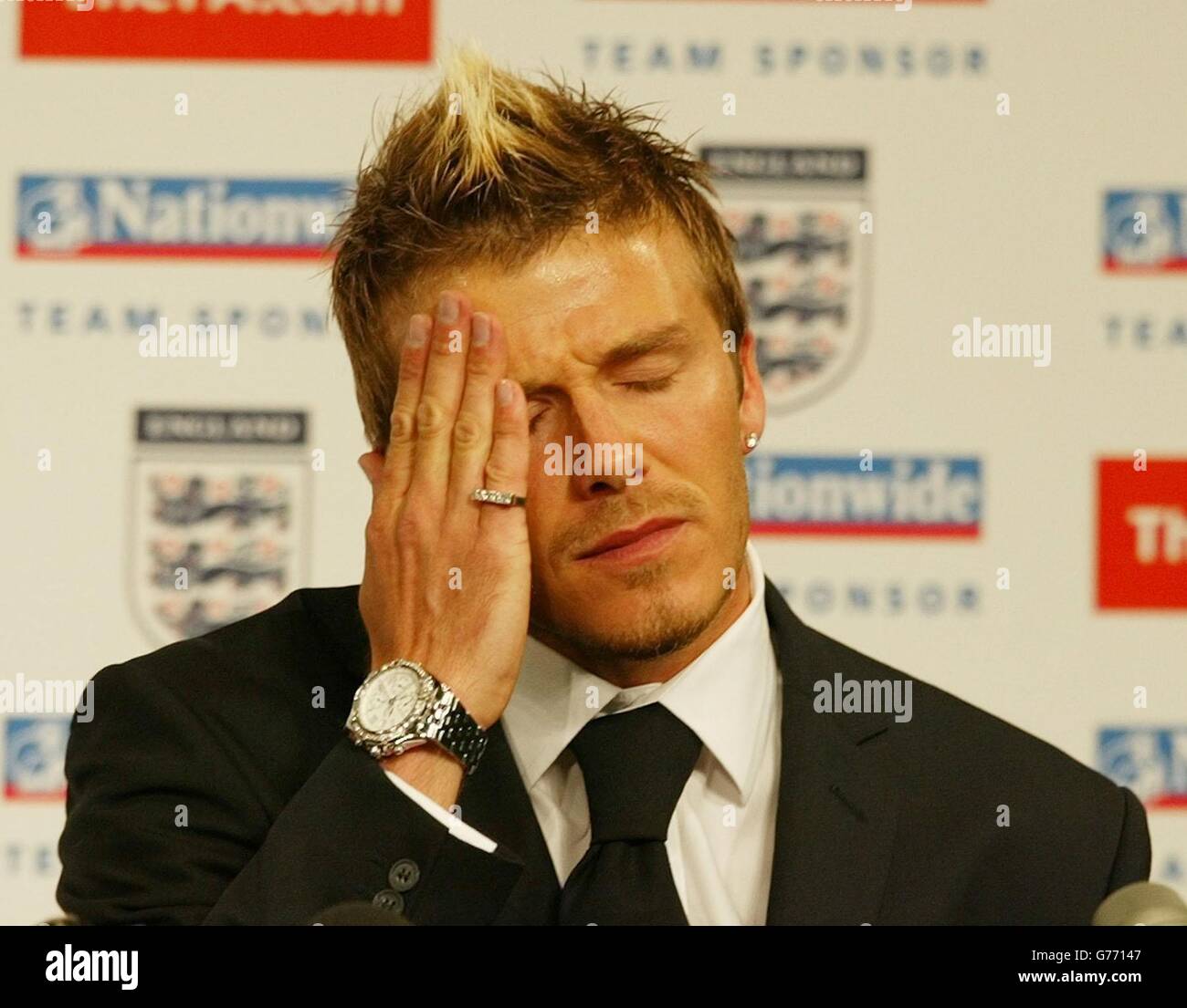 Sport football head shoulders hand on face david beckham hi-res stock ...