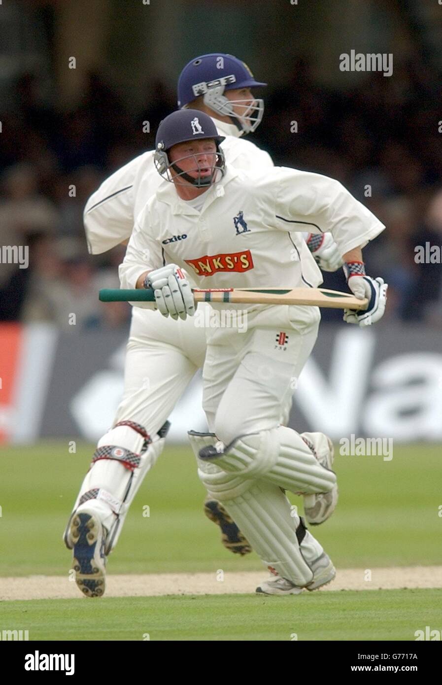 Warwickshire's Ian Bell (front) and Jim Troughton in action during ...