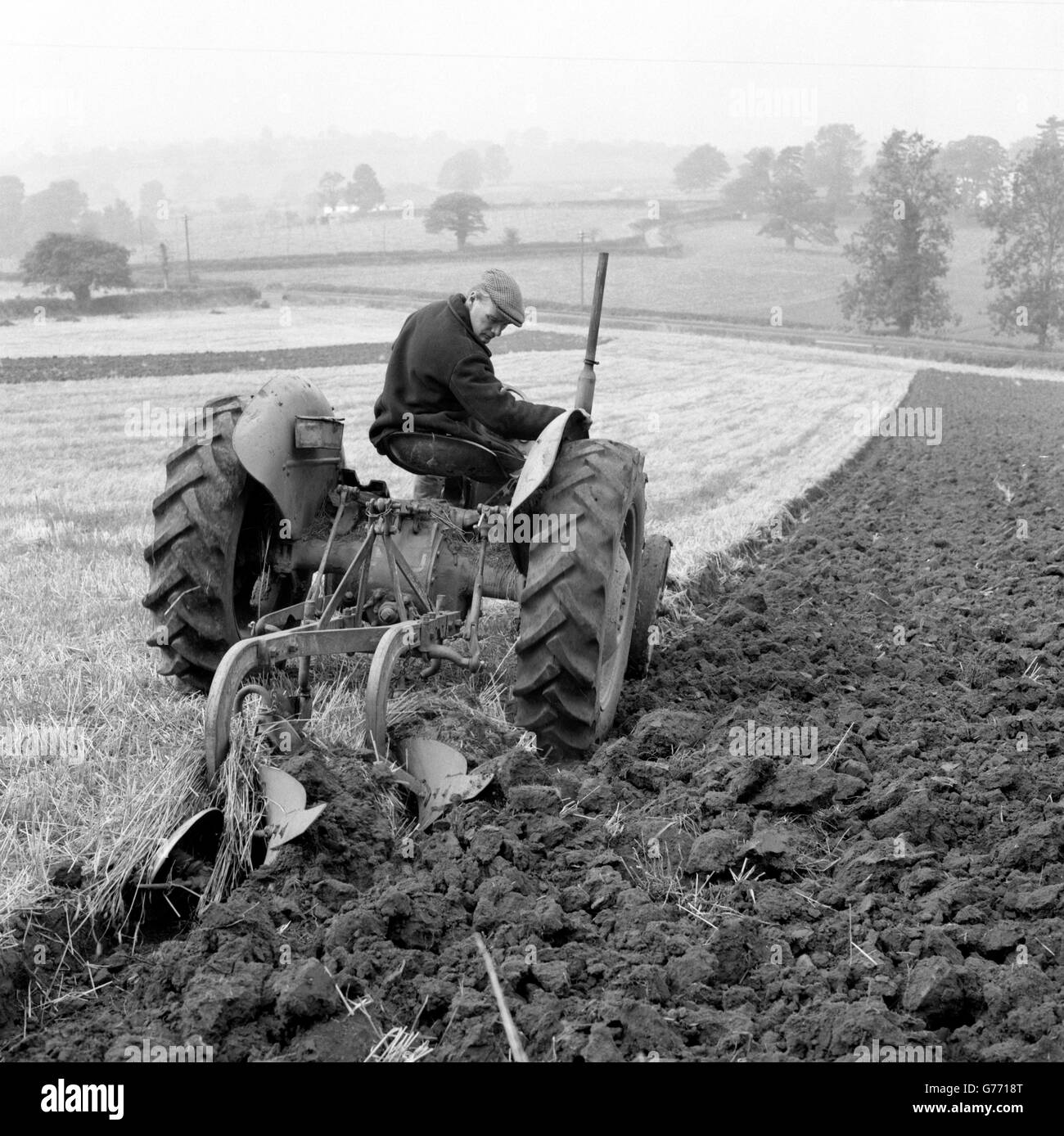 National Hunt jockey Michael Scudamore driving a tractor and plough ...