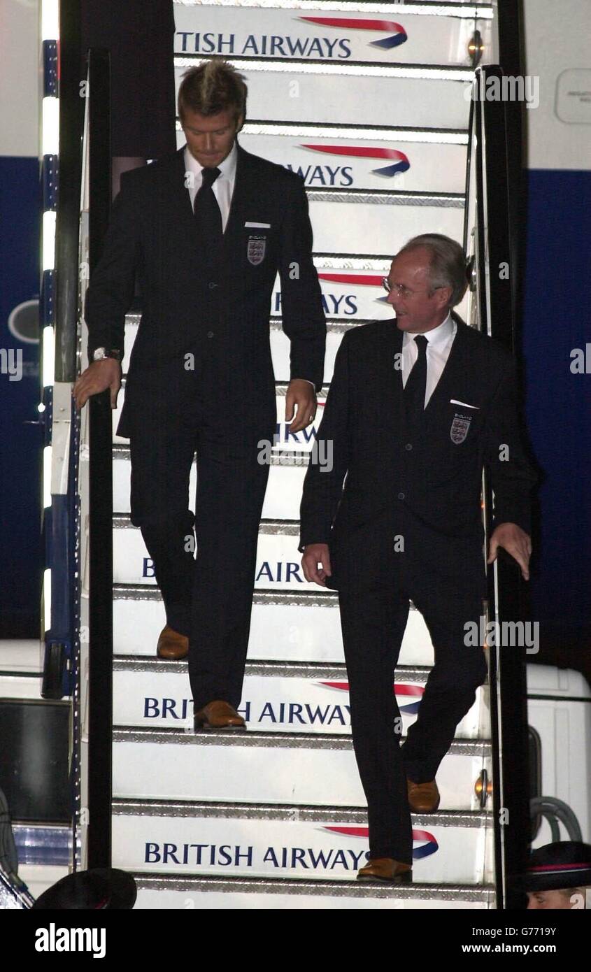 England captain David Beckham (L) and manager Sven-Goran Eriksson step ...