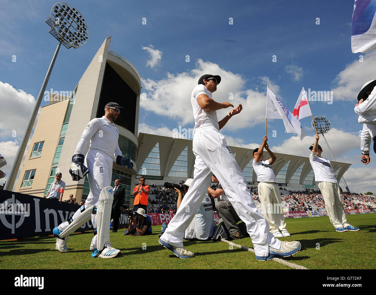 England's Captain Alastair Cook leads out his team against India's ...