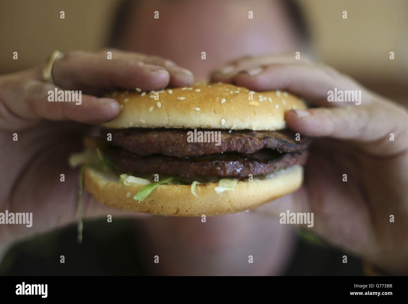 A generic stock photo of a half-pounder burger and chips in a takeaway ...