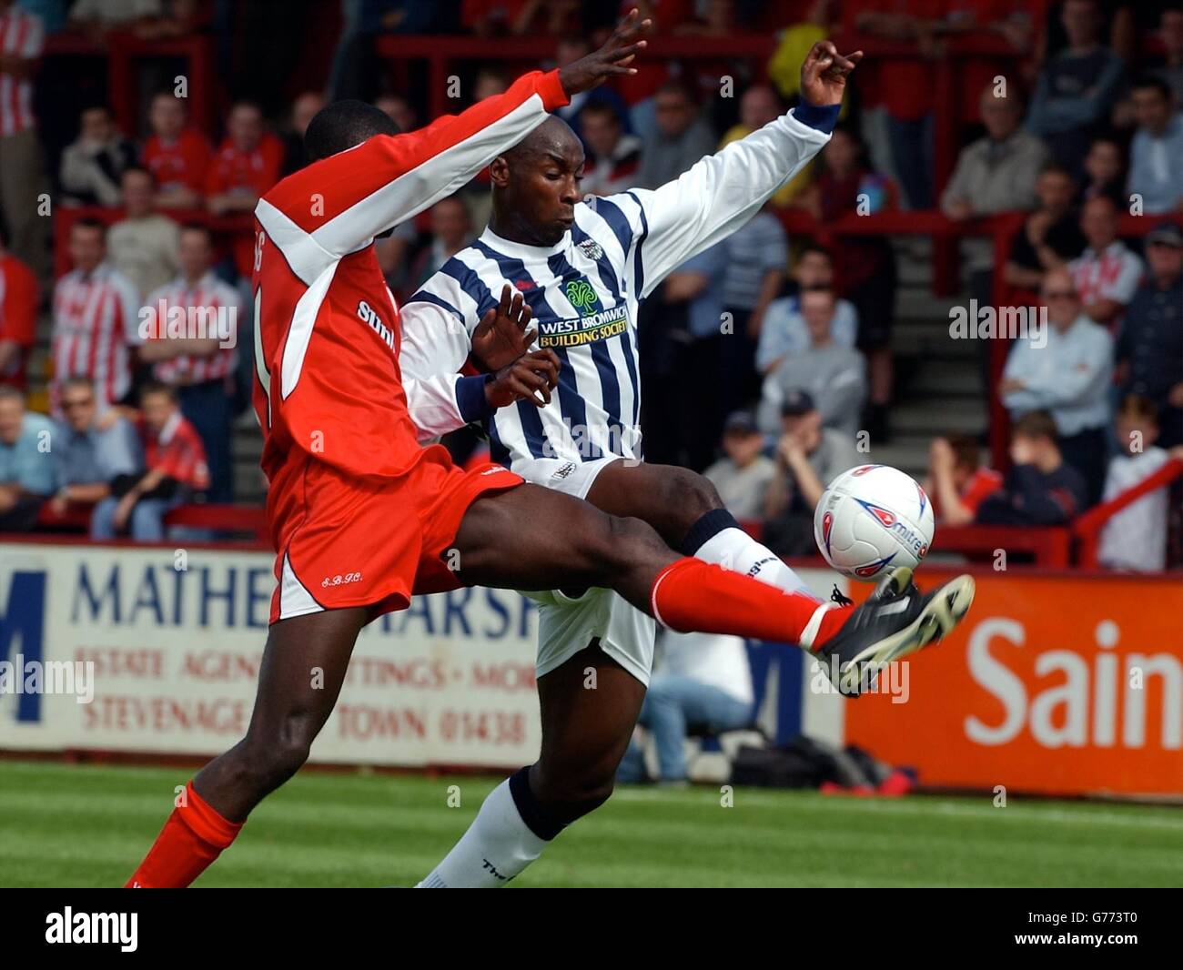 West Bromwich Albion's Jason Roberts takes on the Stevenage Borough ...