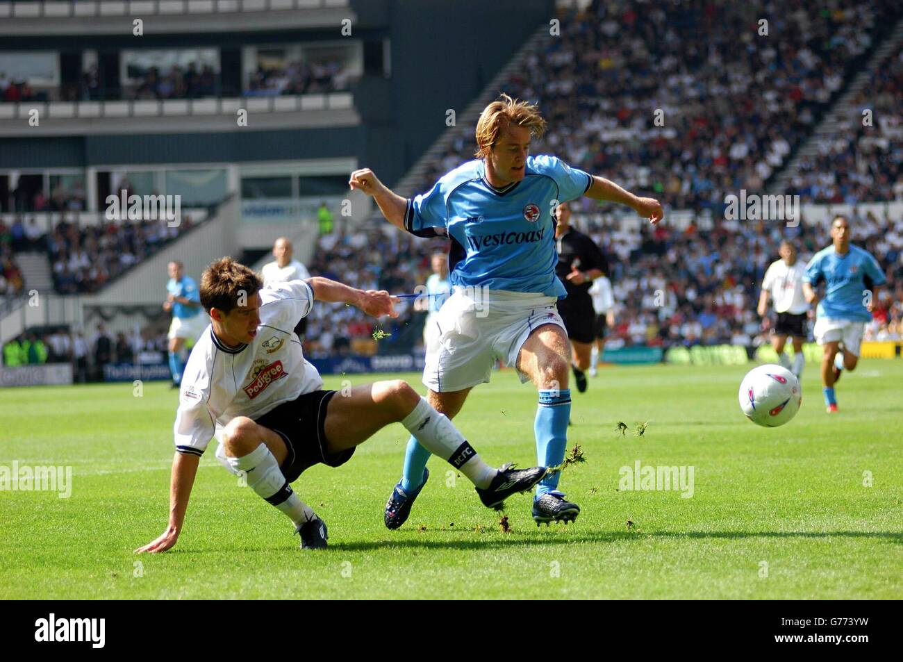 Derby's Chris Riggot goes in hard on Bristol striker Martin Butler ...