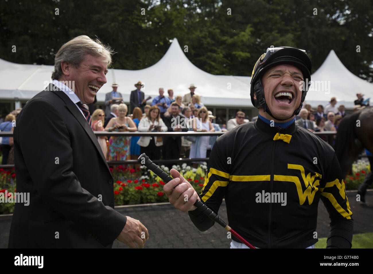 American trainer Wesley Ward shares a joke with jockey Frankie Dettori ...